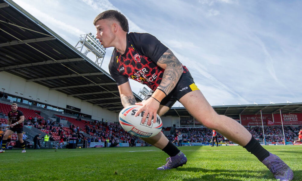 Bizarre moment as Super League player nearly jumps over the top of pile ...