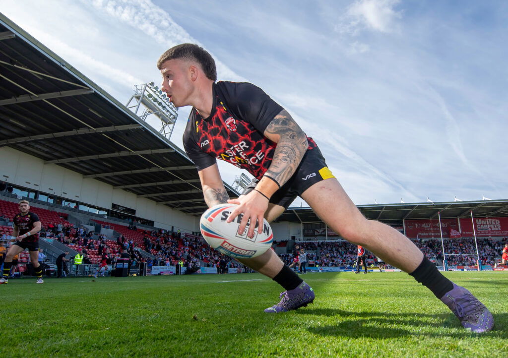 Bizarre moment as Super League player nearly jumps over the top of pile ...